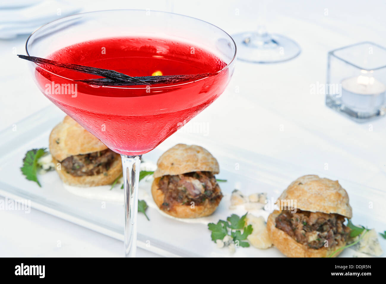 Happy hour cocktails with pork sliders Stock Photo - Alamy
