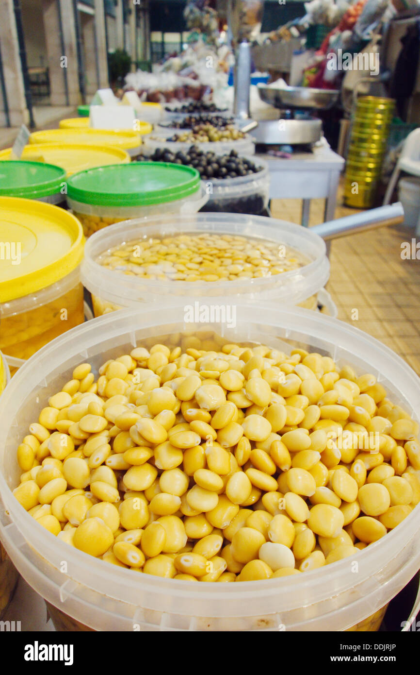 Stand with lupin beans and olives Stock Photo - Alamy