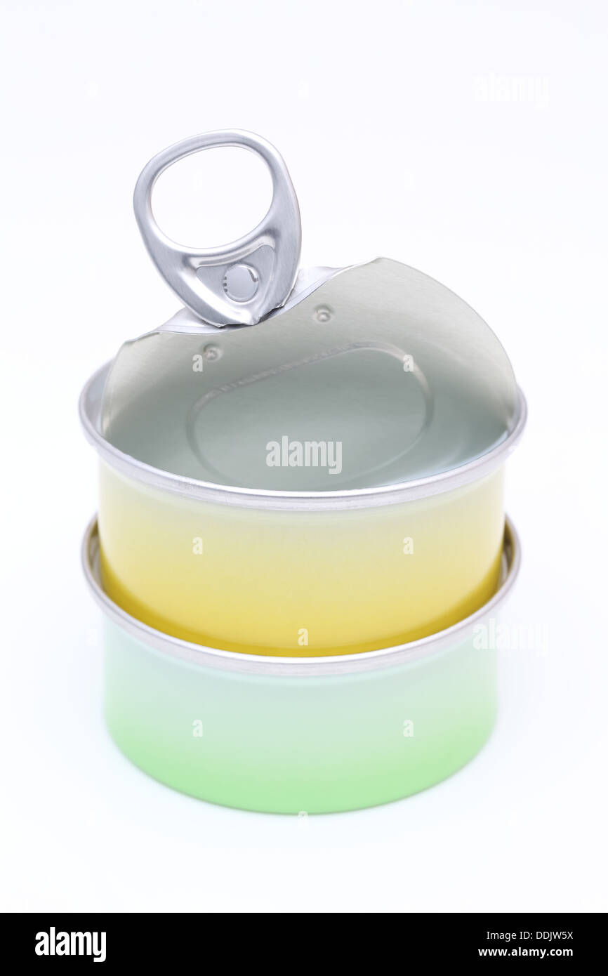 Empty opened tin can on white background Stock Photo - Alamy