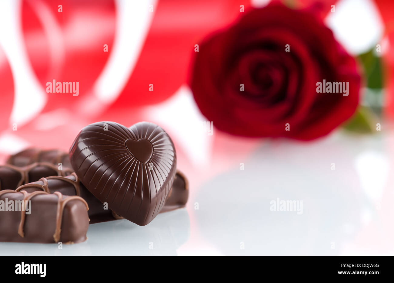 Heart, chocolates and flower Stock Photo - Alamy