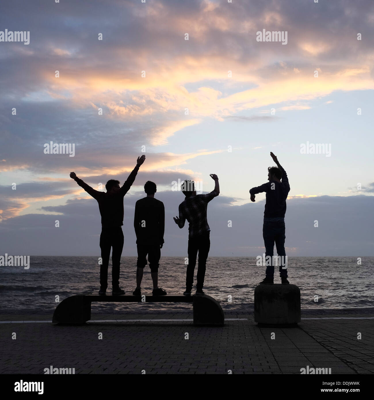 Four men silhouette hi-res stock photography and images - Alamy