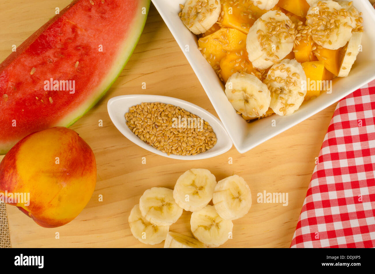 Healthy breakfast with fresh fruit and linseed Stock Photo - Alamy