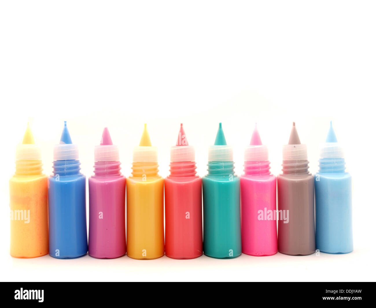 Color tubes with a paint on a white background Stock Photo - Alamy