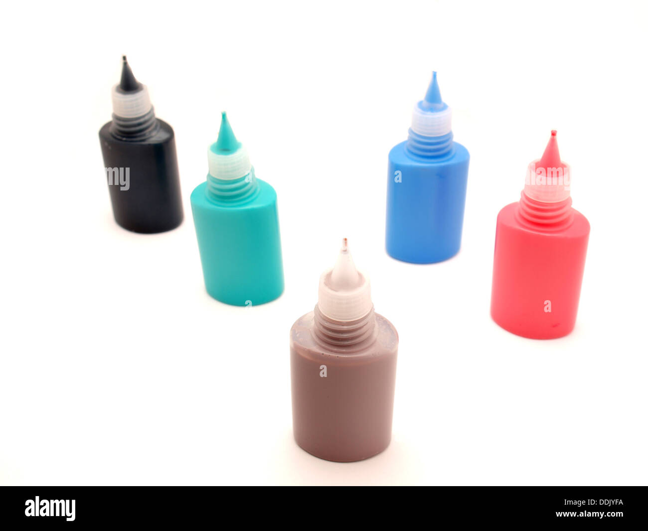 Color tubes with a paint on a white background Stock Photo - Alamy