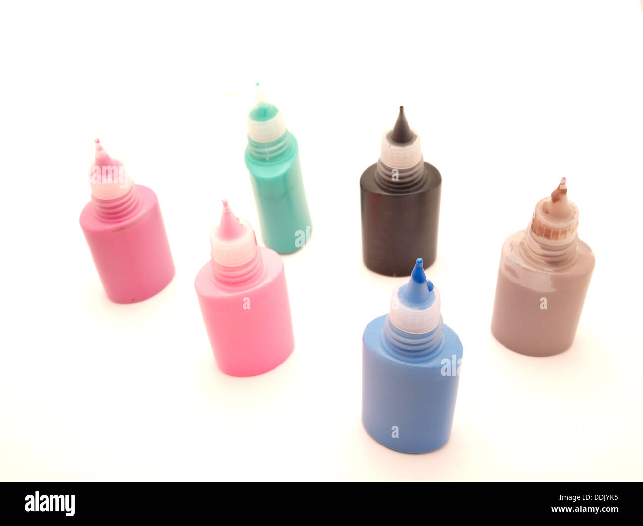 Color tubes with a paint on a white background Stock Photo - Alamy