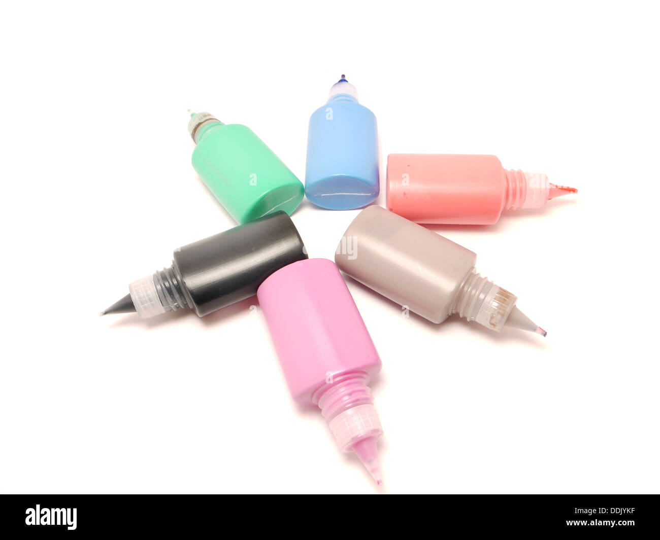 Color tubes with a paint on a white background Stock Photo - Alamy
