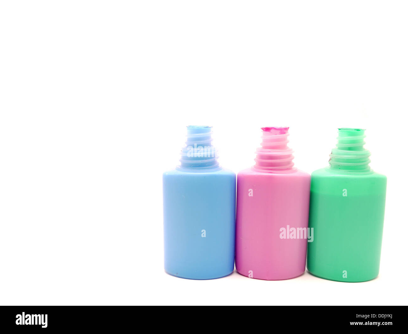 Color tubes with a paint on a white background Stock Photo - Alamy
