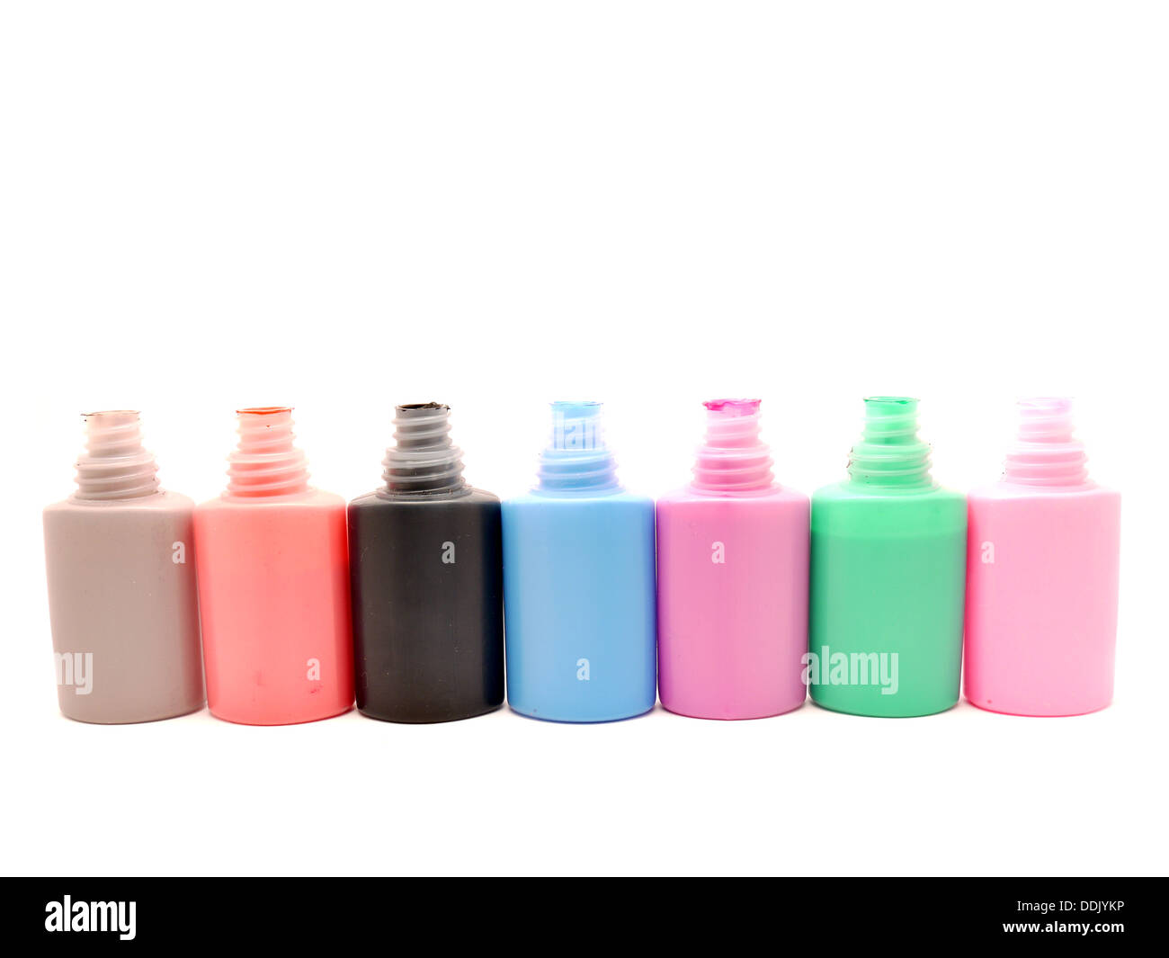 Color tubes with a paint on a white background Stock Photo - Alamy