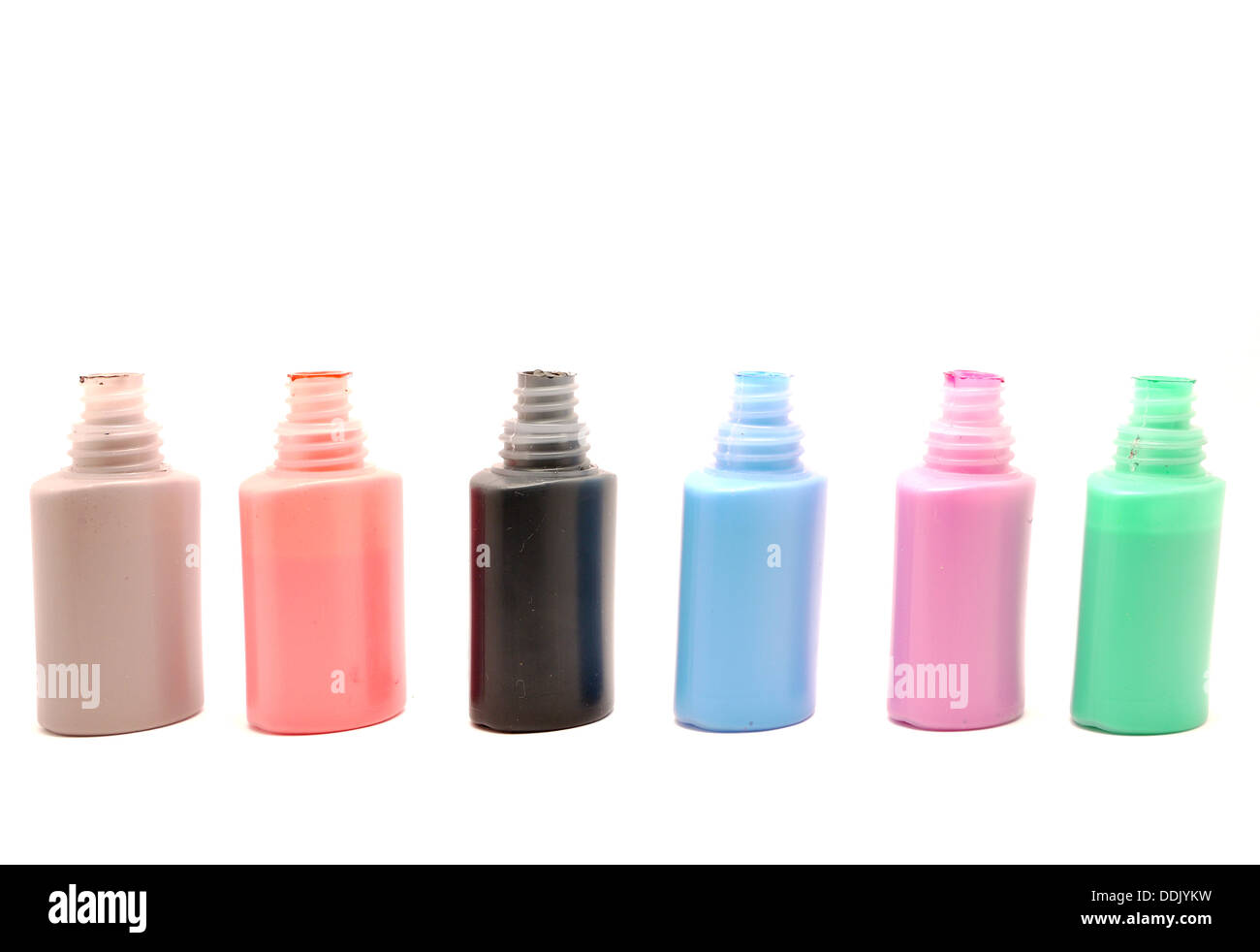 Color tubes with a paint on a white background Stock Photo - Alamy