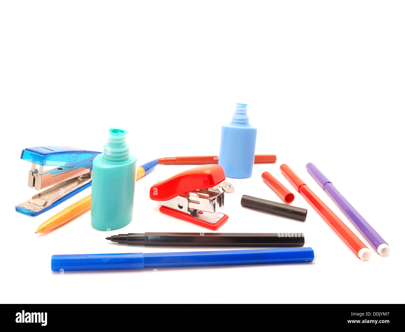 Stapler, the handle and a felt-tip pen on a white background Stock ...