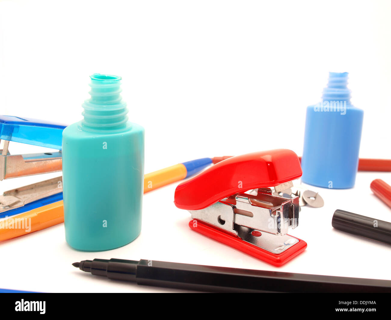 Stapler, the handle and a felt-tip pen on a white background Stock ...