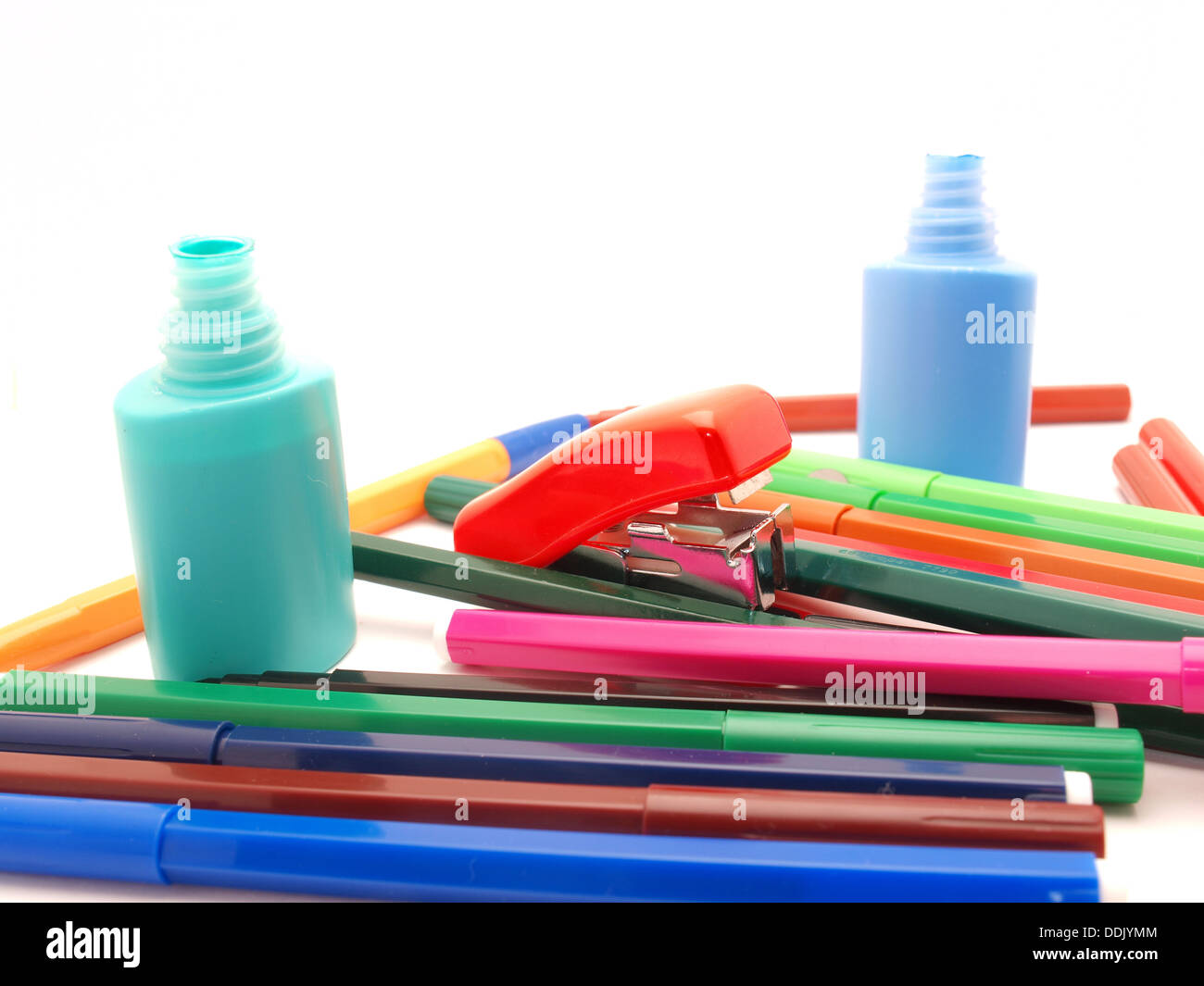 Stapler, the handle and a felt-tip pen on a white background Stock ...