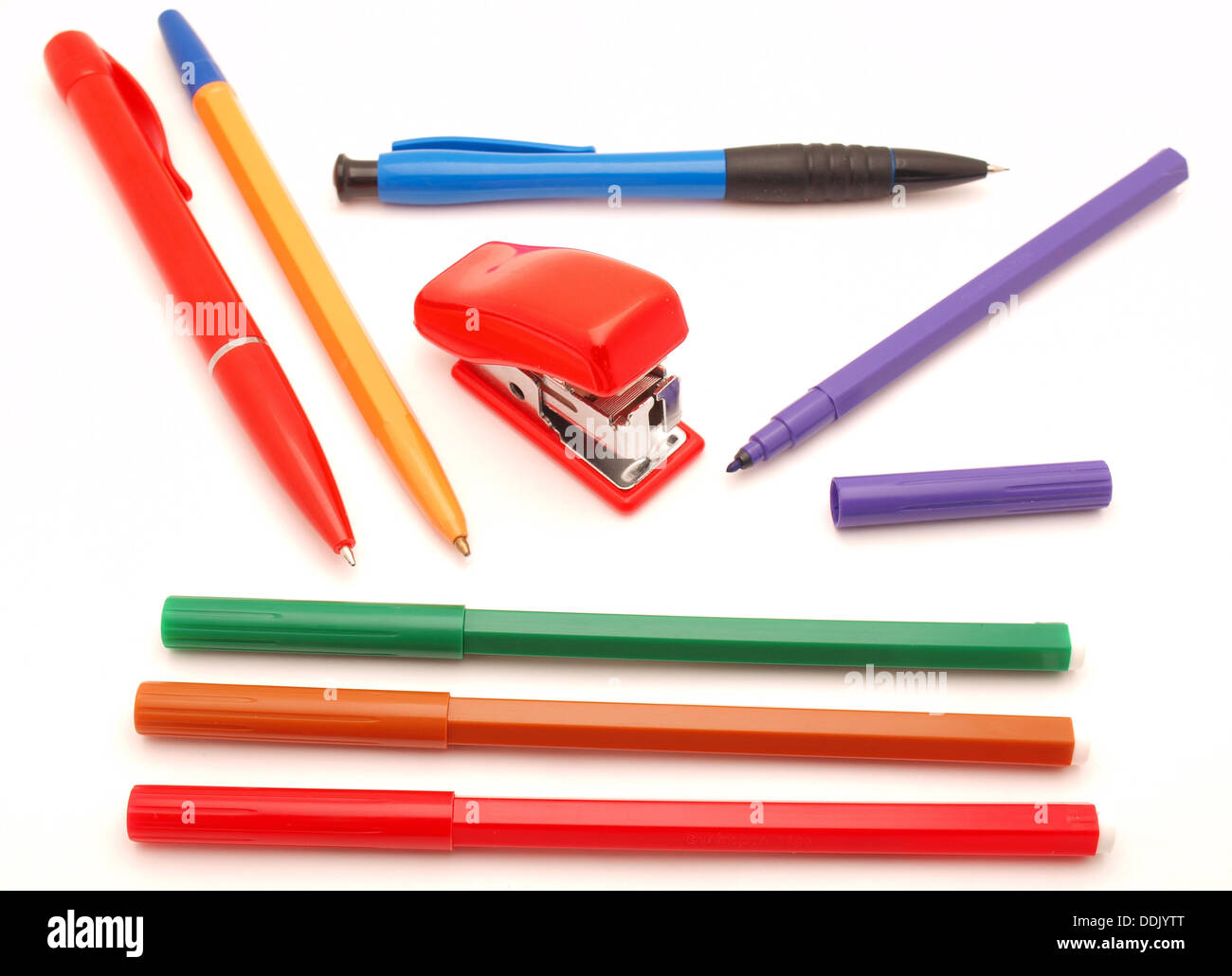 Stapler, the handle and a felt-tip pen on a white background Stock ...
