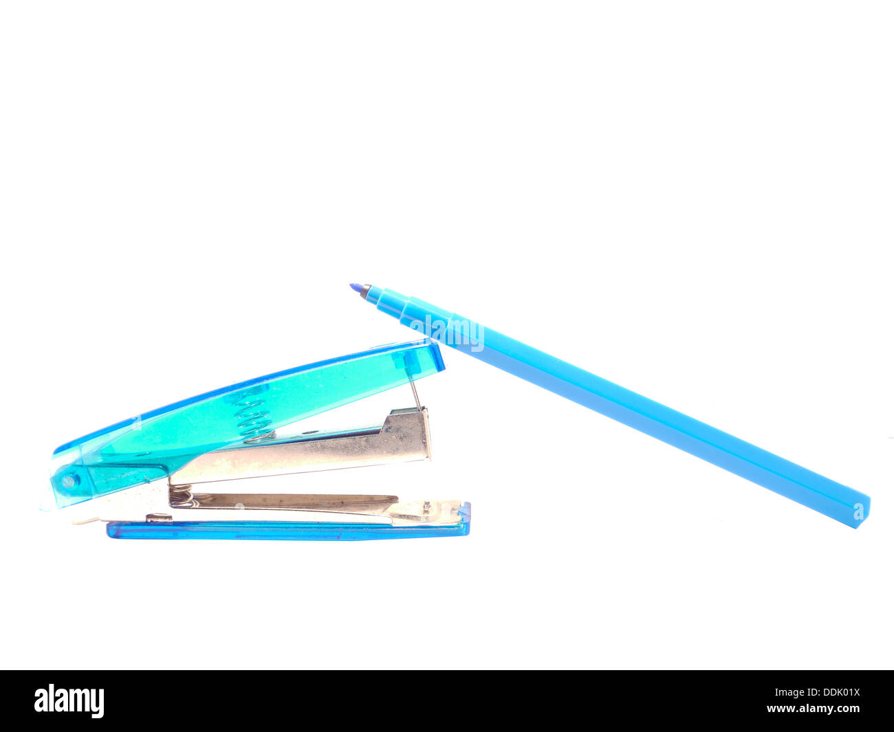 Stapler and a felt-tip pen on a white background Stock Photo - Alamy