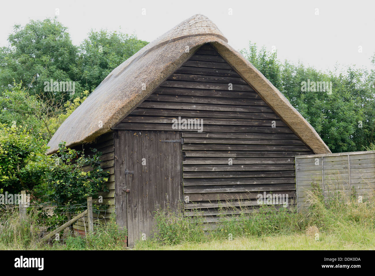 Thatched wooden hut at Avebury. Wiltshire. England Stock Photo - Alamy