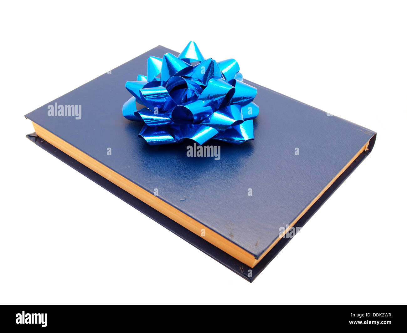 The book with a bow on a white background Stock Photo - Alamy