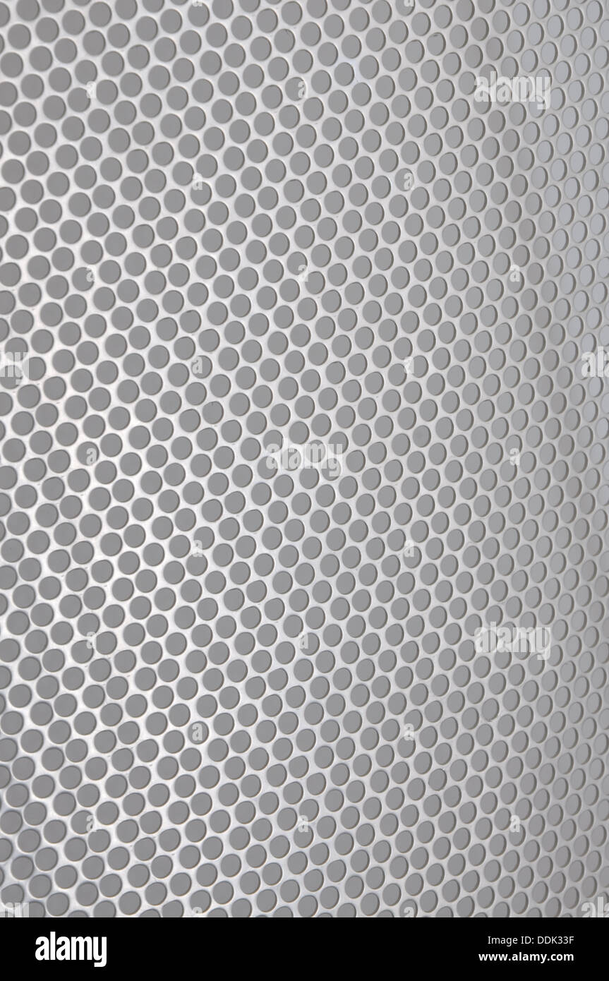 Metal sheet surface with holes Stock Photo - Alamy