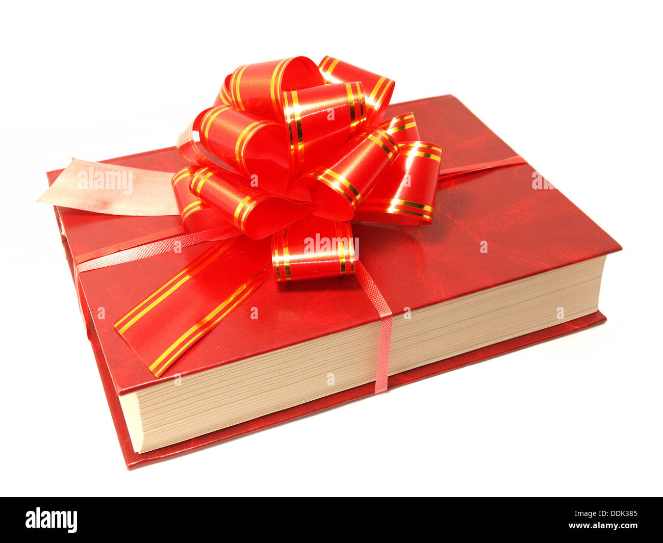 The book with a bow on a white background Stock Photo - Alamy