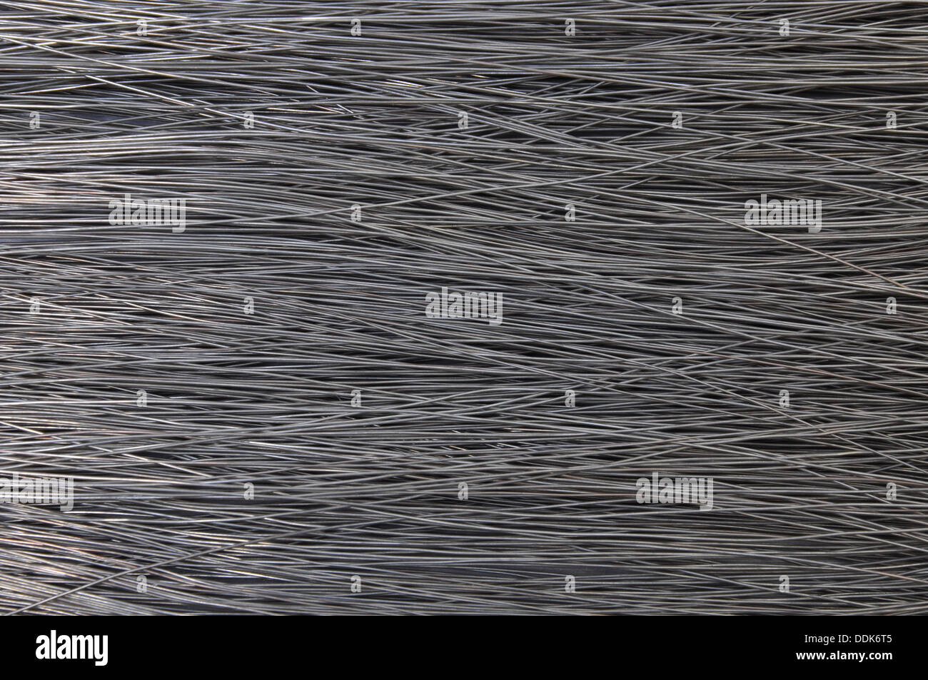 Steel wire industry background Stock Photo - Alamy