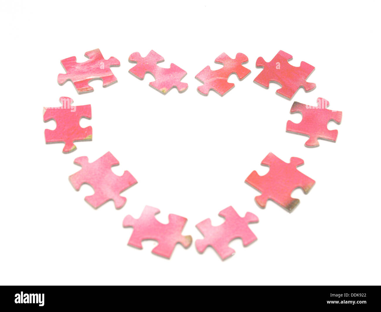 Heart. Puzzle pieces on a white background Stock Photo - Alamy