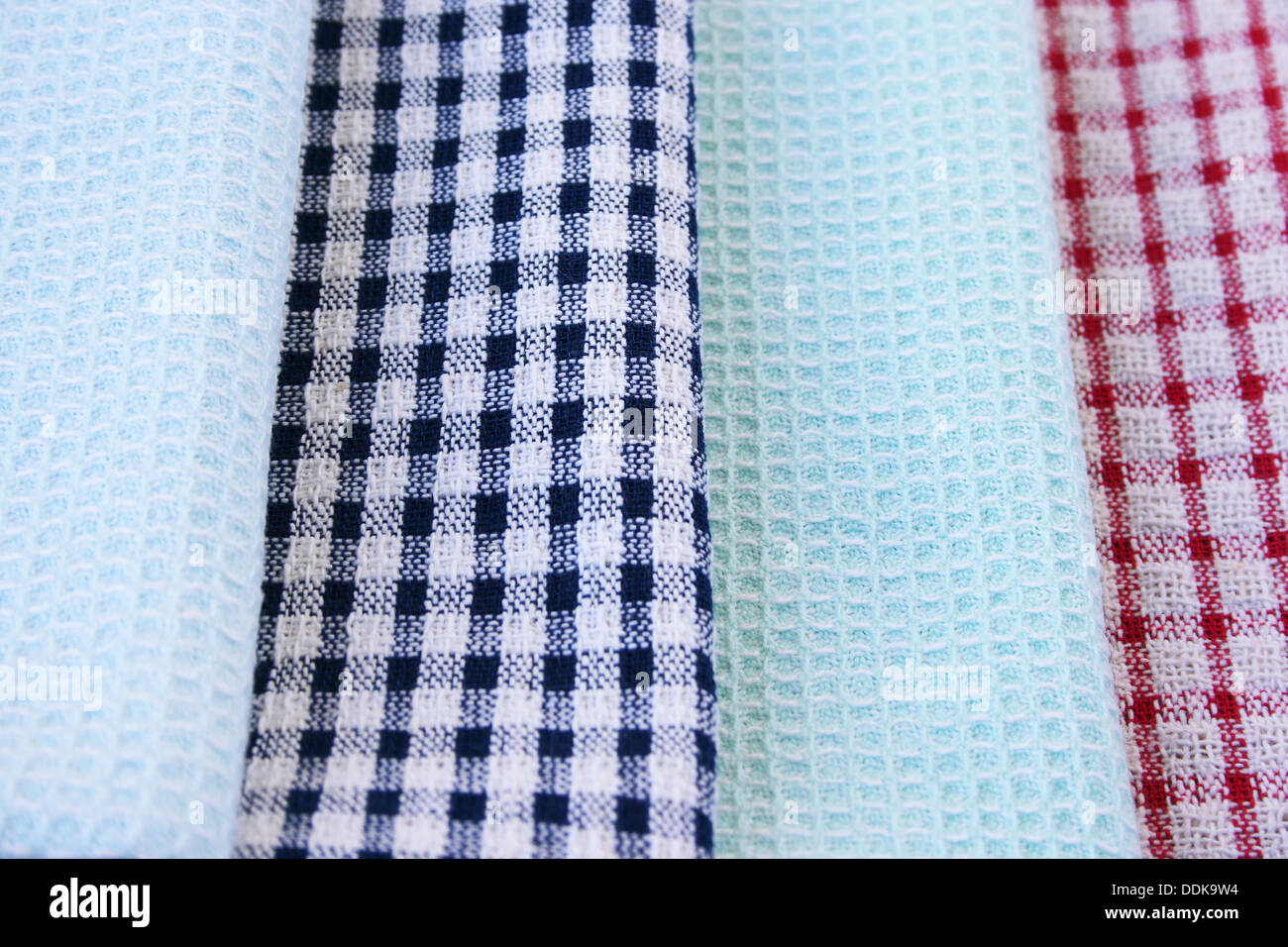 Colorful kitchen towels as a background Stock Photo - Alamy