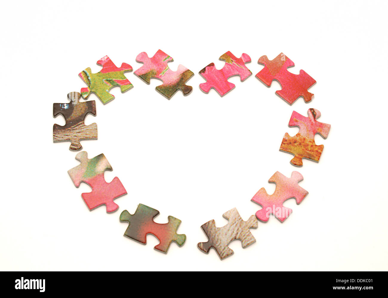 Heart from a puzzle on a white background Stock Photo - Alamy