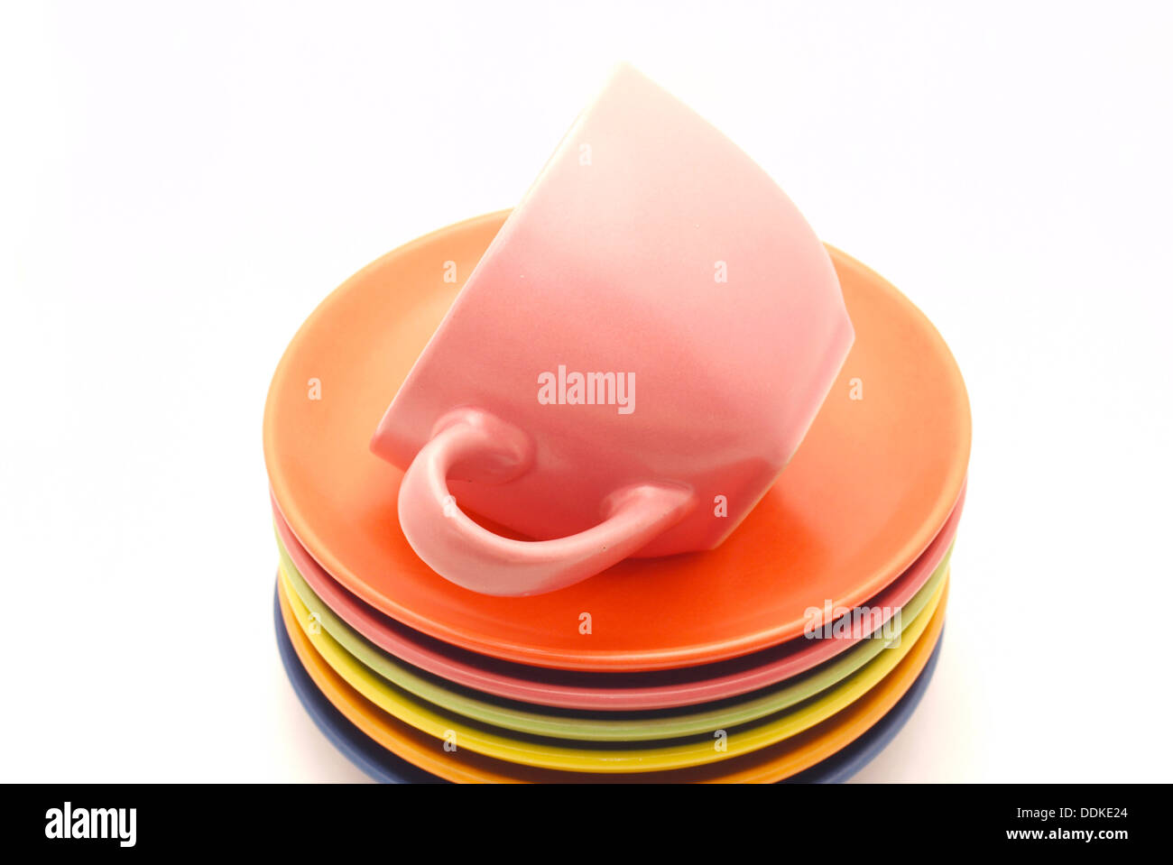 Cup and plates on a white background Stock Photo - Alamy