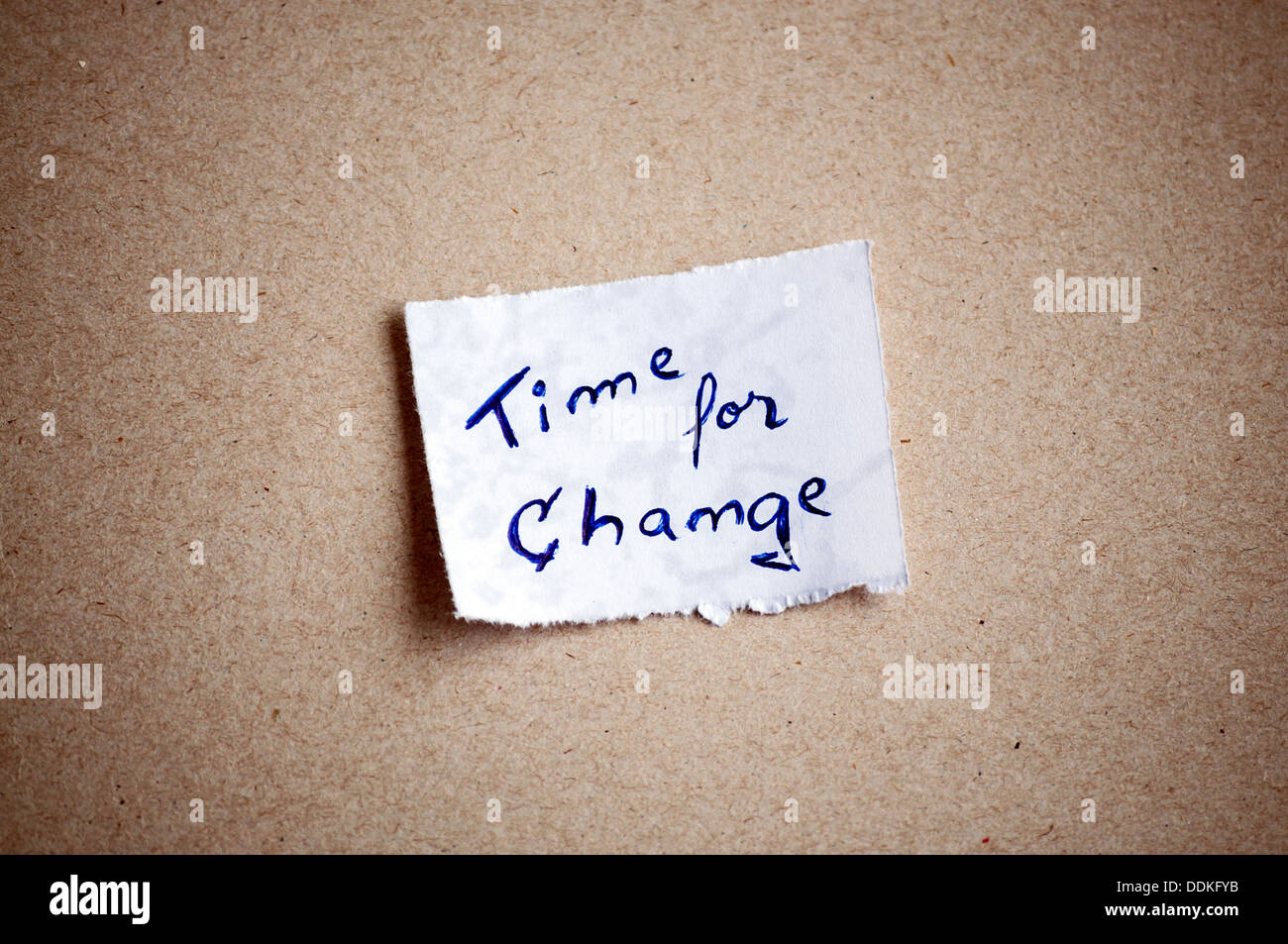 Time for change message,written on piece of paper, on cardboard ...