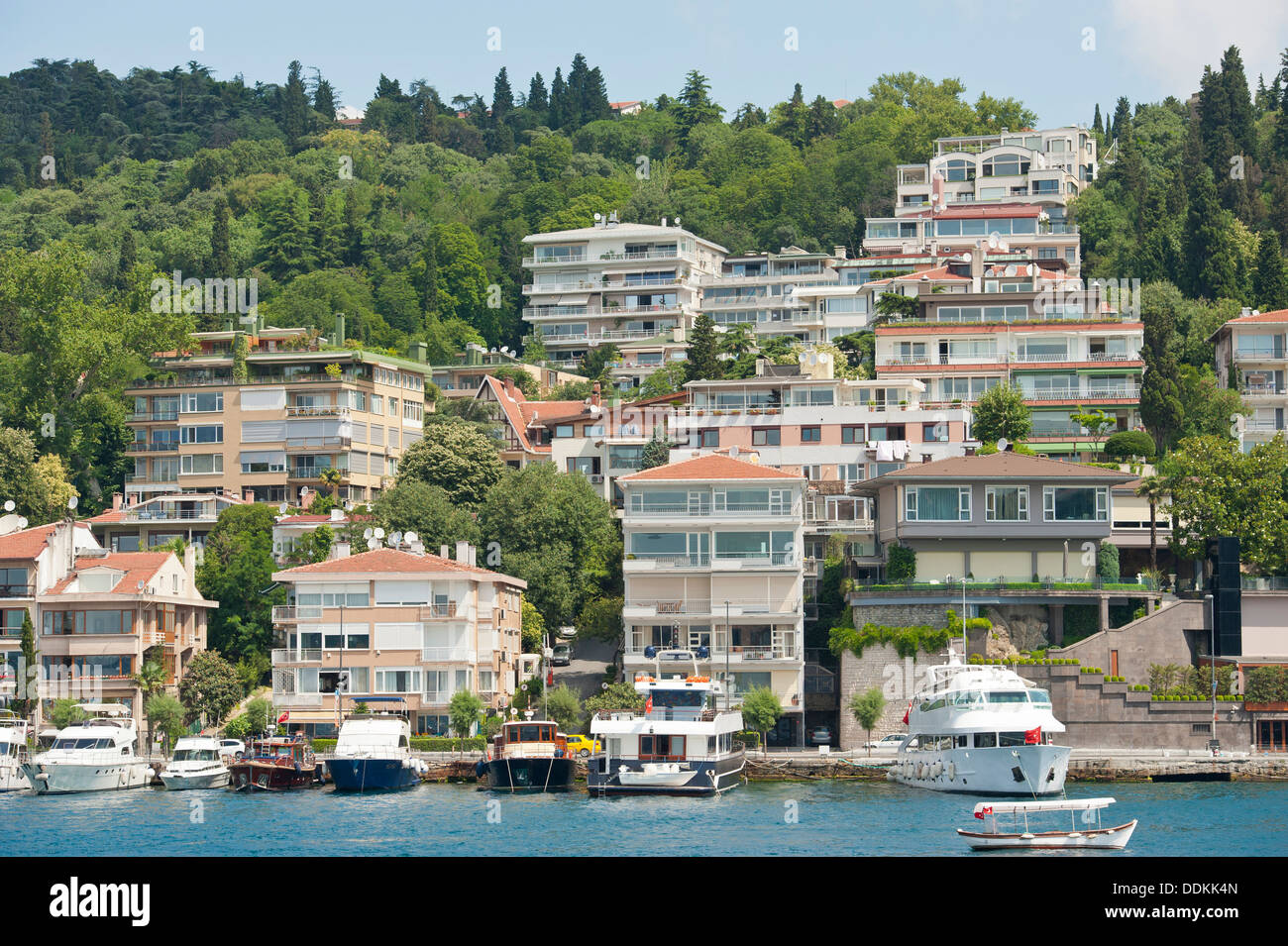 Luxury apartment blocks on hillside next to large river Stock Photo - Alamy