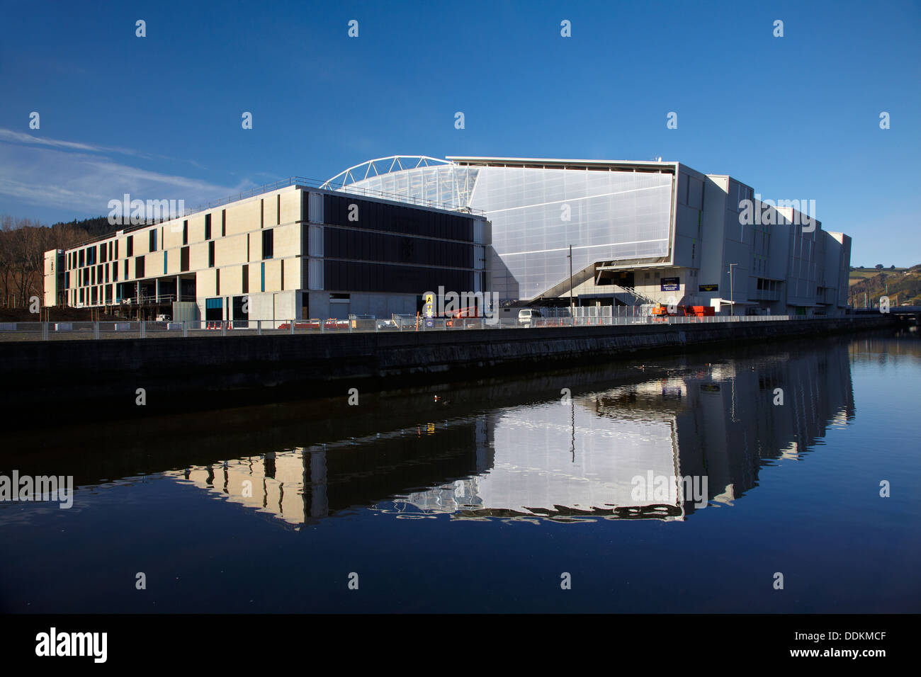 Forsyth Barr Stadium reflected in Water of Leith, Dunedin, South Island ...