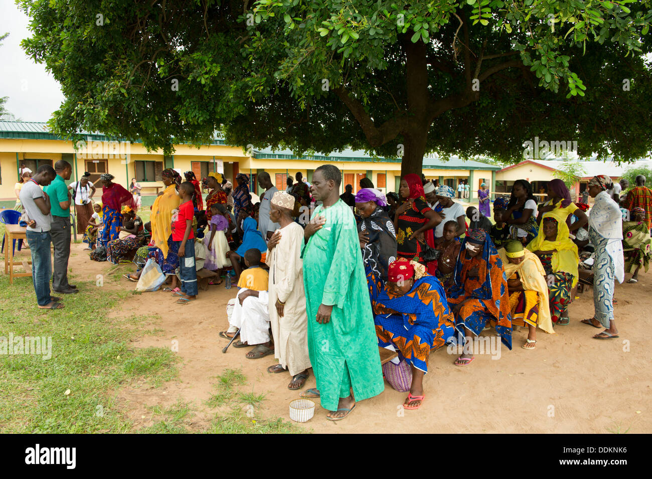 Nigerian villagers praying Nigeria under the shade of a tree Stock ...