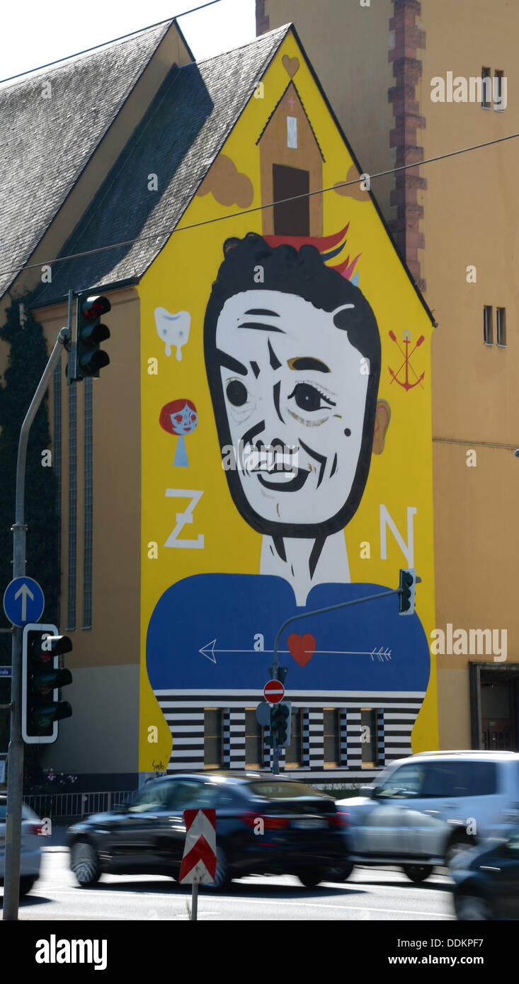 A large work of street art by Brazilian artist Speto is seen on the ...