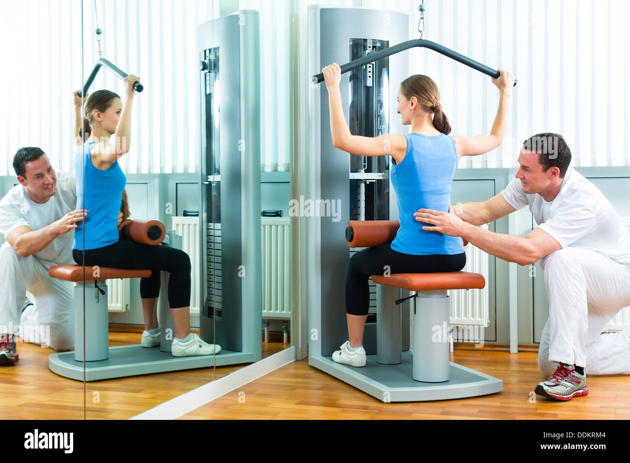 Patient at the physiotherapy making physical exercises with her ...