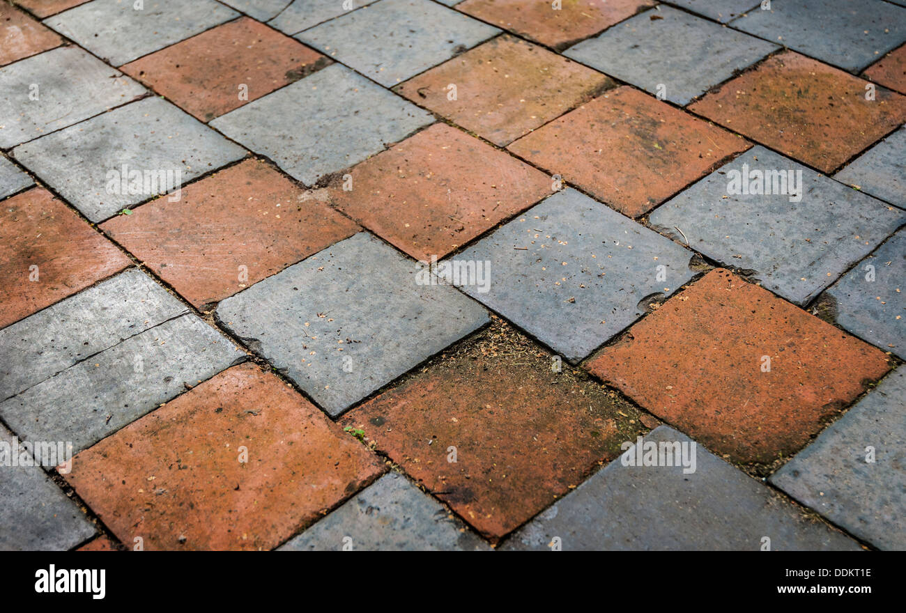 Old checkered Victorian floor tiles background Stock Photo - Alamy