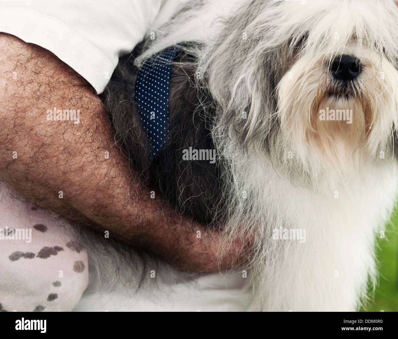 Carry in his arm hi-res stock photography and images - Alamy