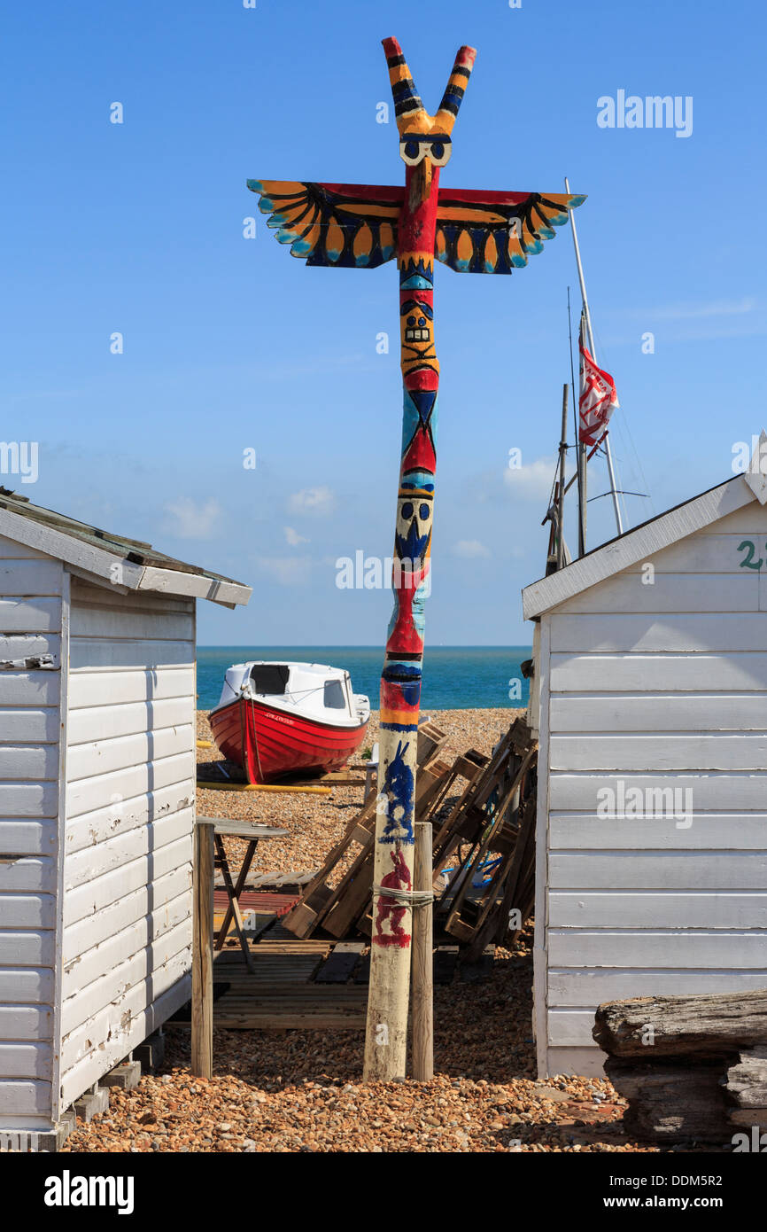 Totem pole between two beach huts on Walmer beach in Deal, Kent ...