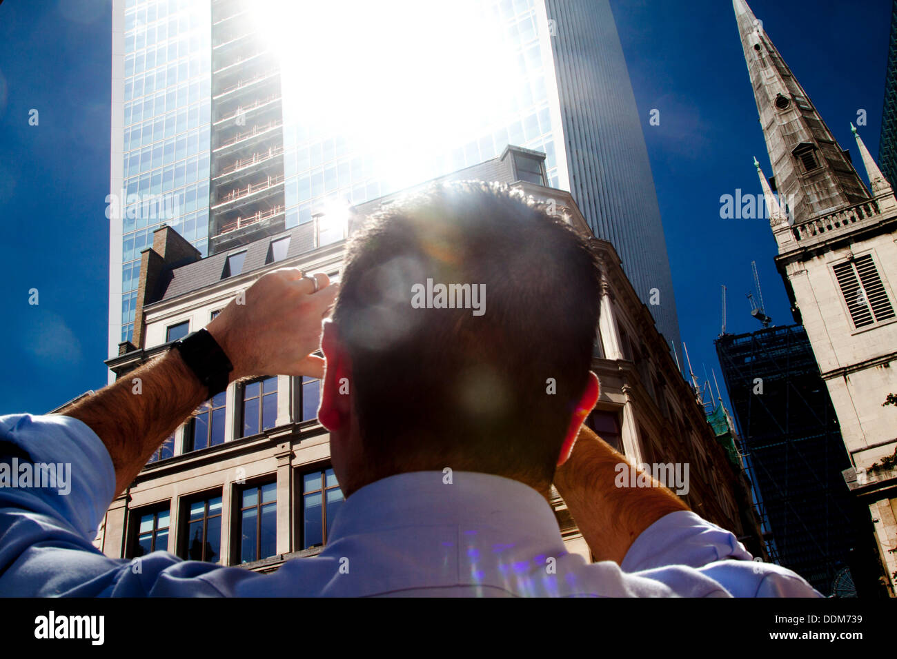 London, UK. 4th September 2013. Sun glares from the concave facade of ...