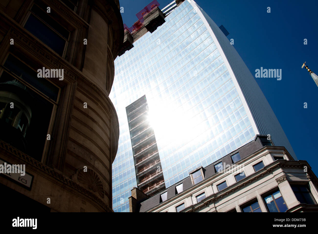 London, UK. 4th September 2013. Sun glares from the concave facade of ...