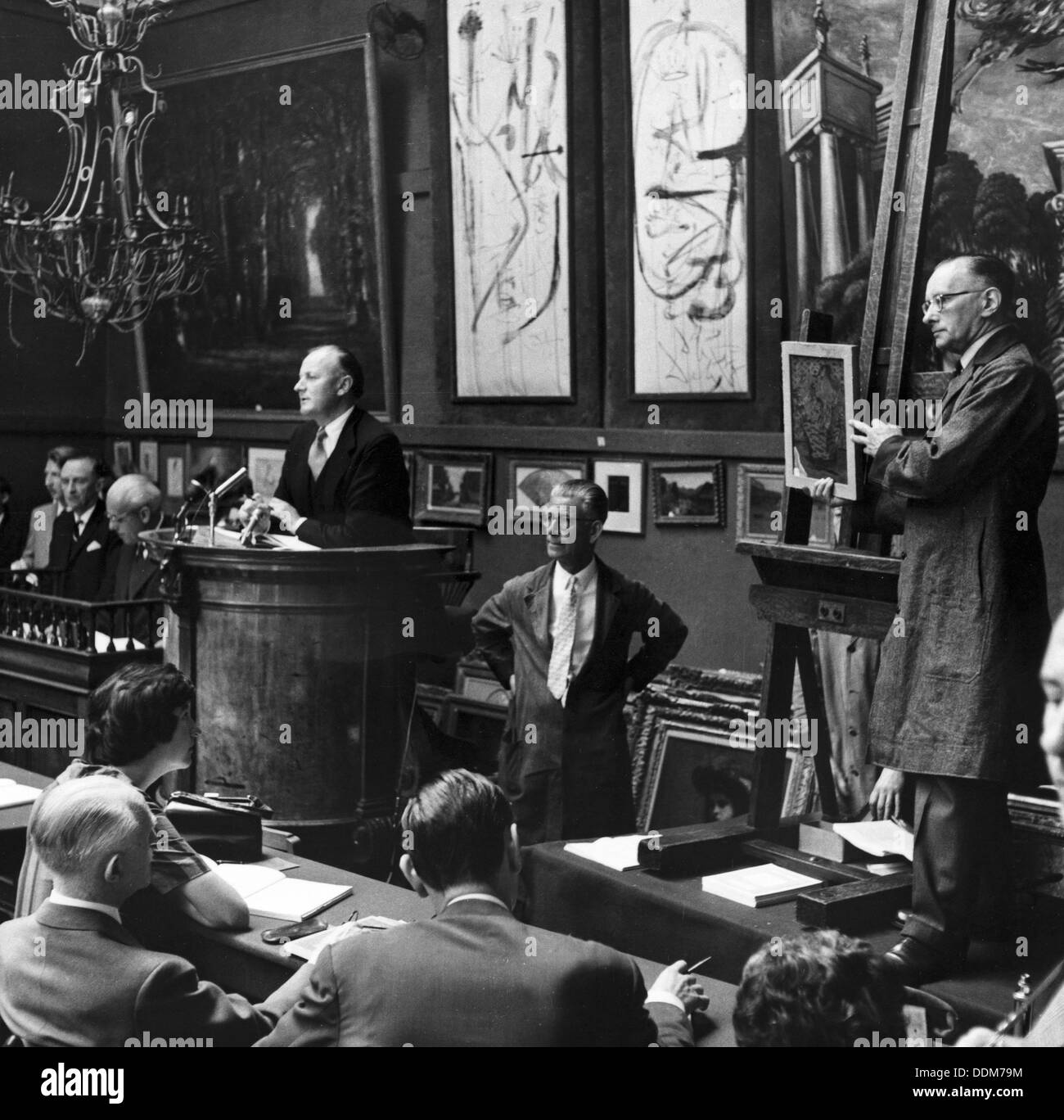 Auction at Sotheby's, London, 1961. Artist: Henry Grant Stock Photo - Alamy