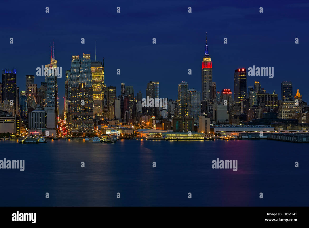 The New York City Skyline during the blue hour after sunset. The Empire ...