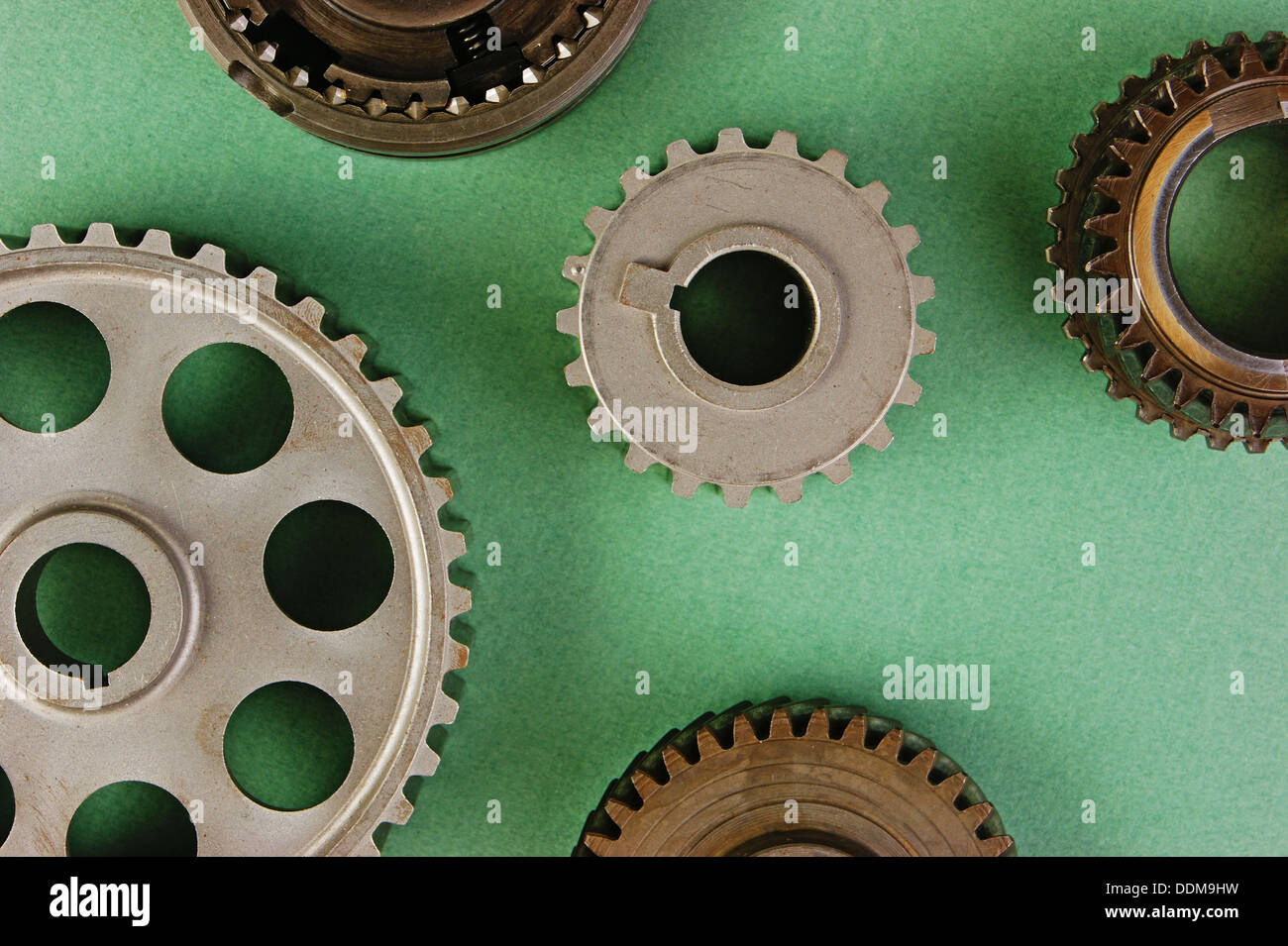 gears on a green background Stock Photo - Alamy