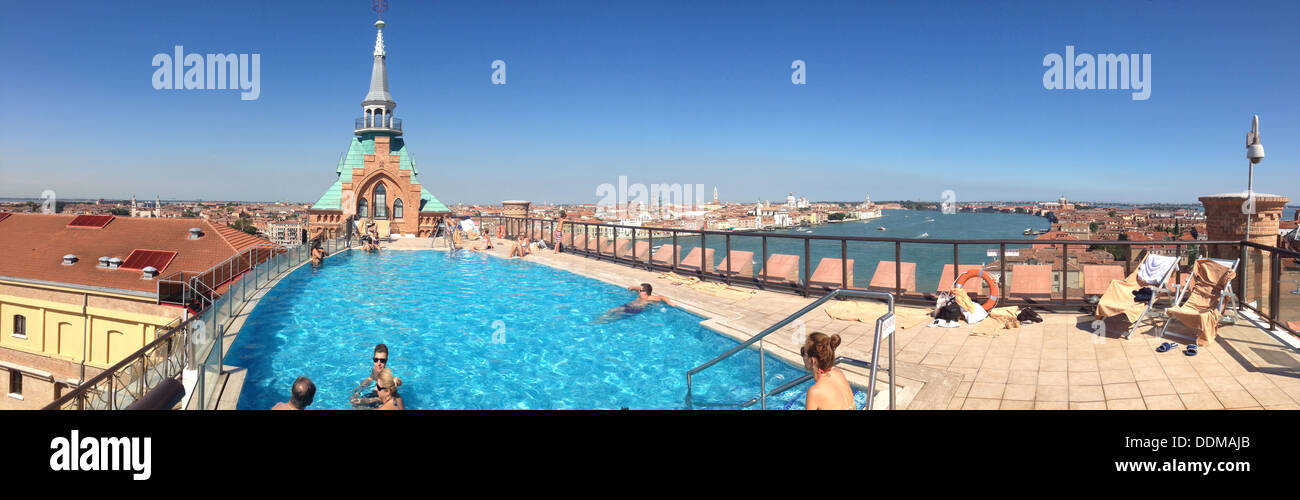 Rooftop pool overlooking Venice at Hilton Molino Stucky Hotel, Italy ...