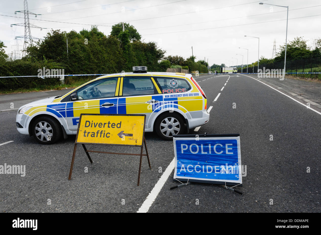 Police close a road following a serious accident Stock Photo - Alamy