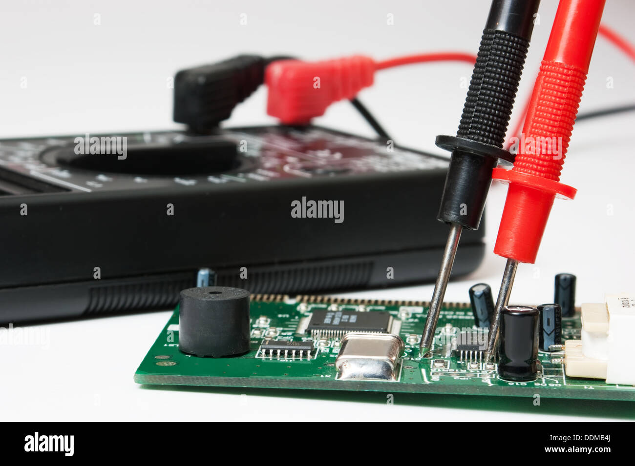 verification testing of electronic boards digital multimeter Stock ...