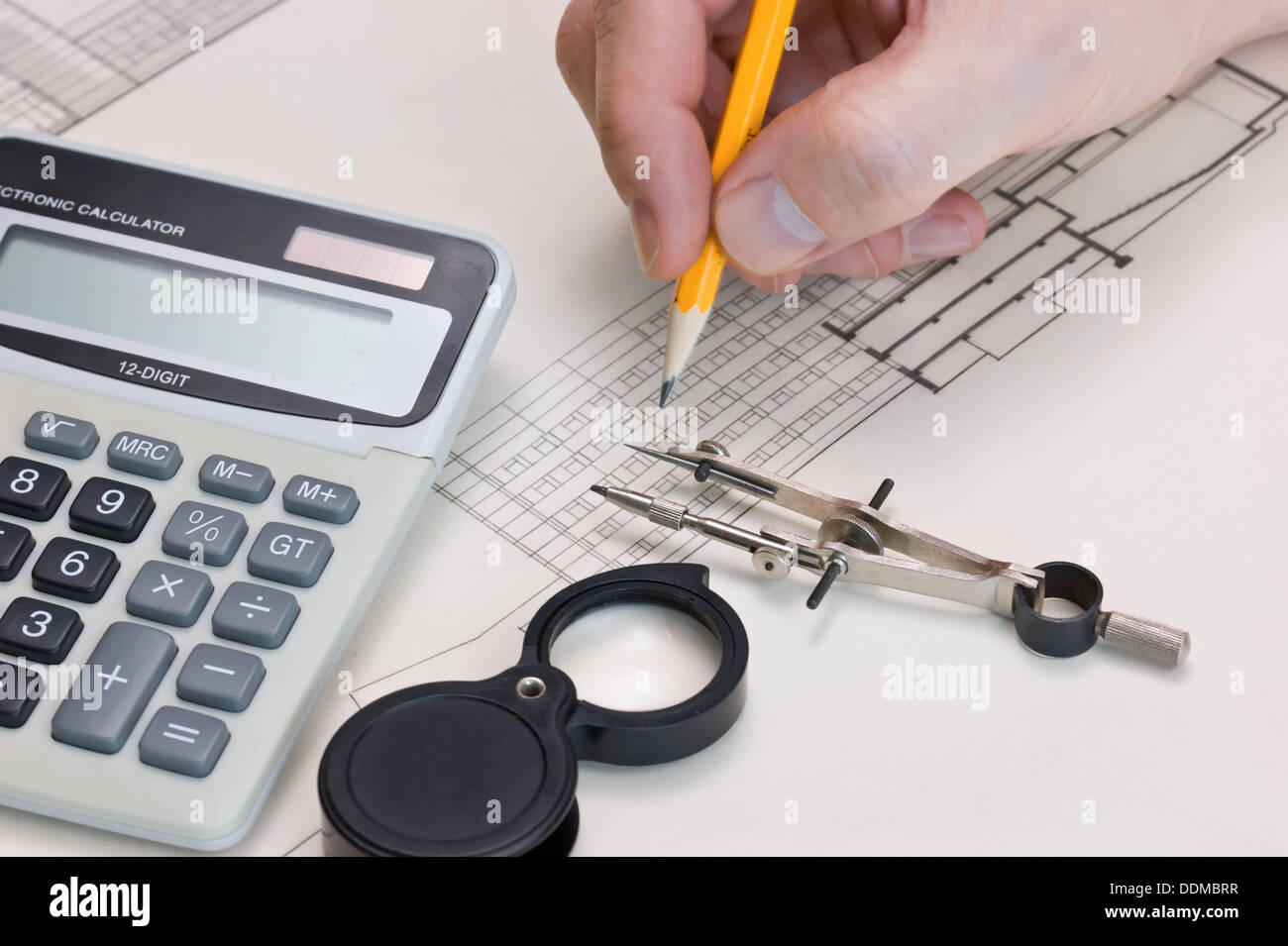 technical drawings and hand with a pencil Stock Photo - Alamy