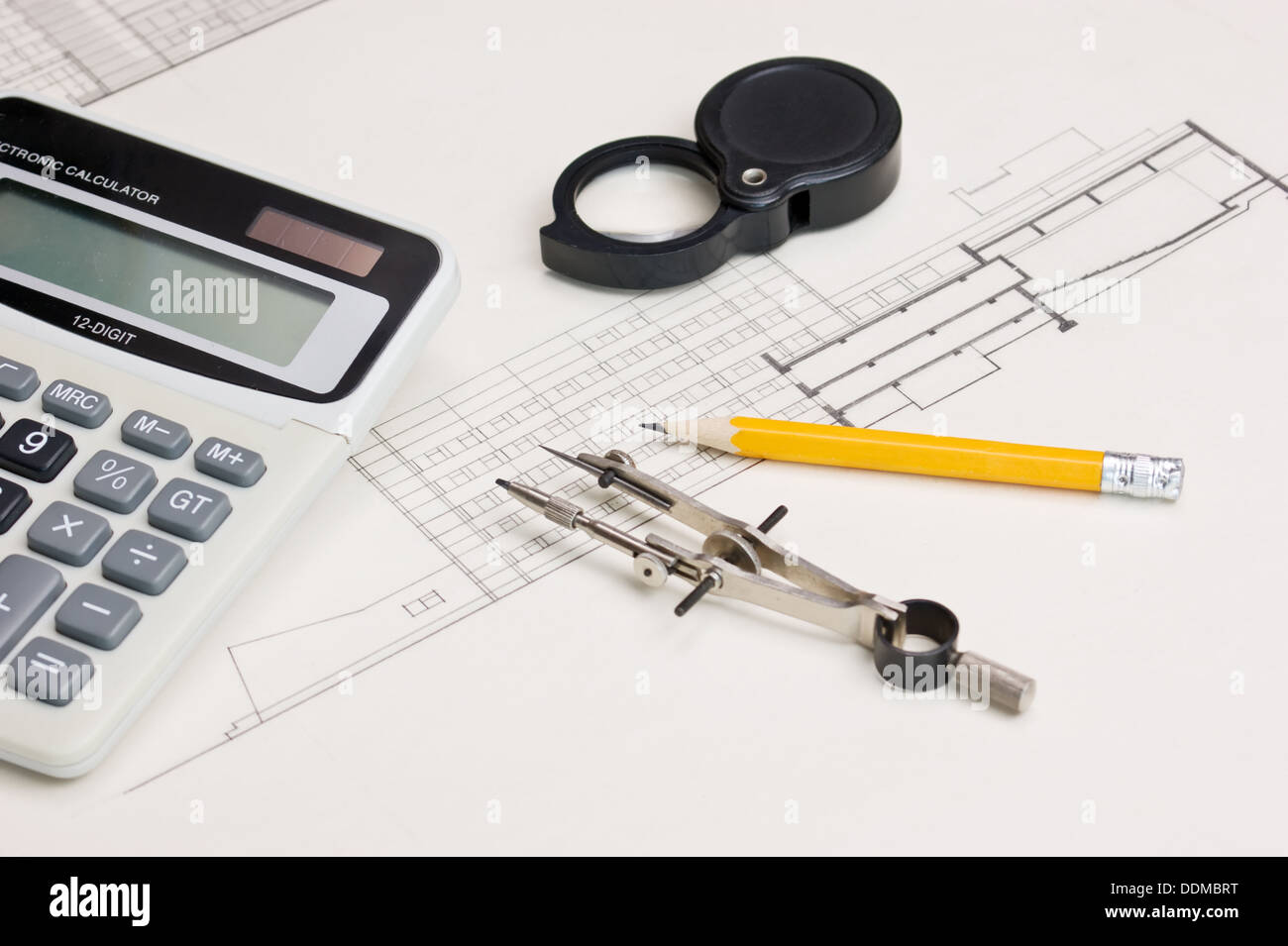 technical drawings and a calculator Stock Photo - Alamy