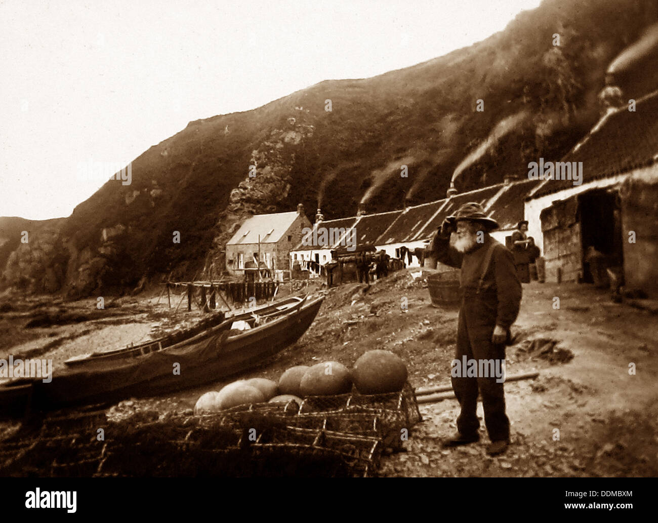 Burnmouth Fisherman early 1900s Stock Photo - Alamy