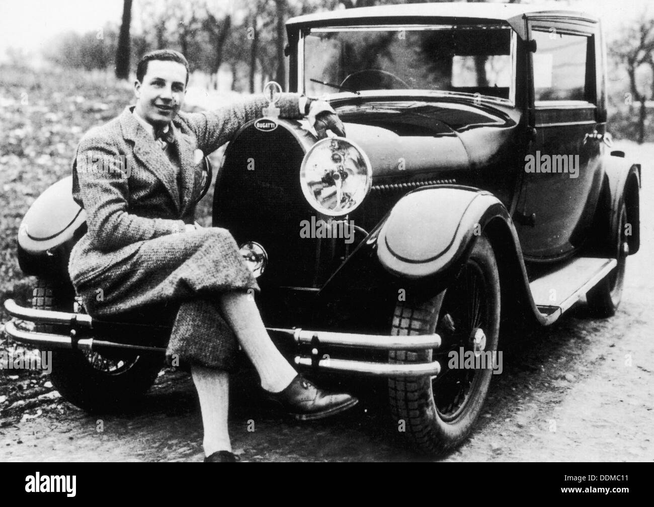 Jean Bugatti pictured with a Bugatti car, 1930s. Artist: Unknown Stock ...