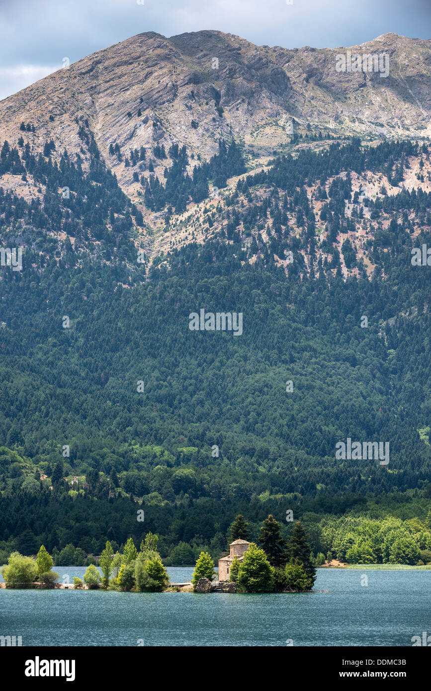 The chapel of Agios Fanourios on Lake Doxis with the mass of Mount ...