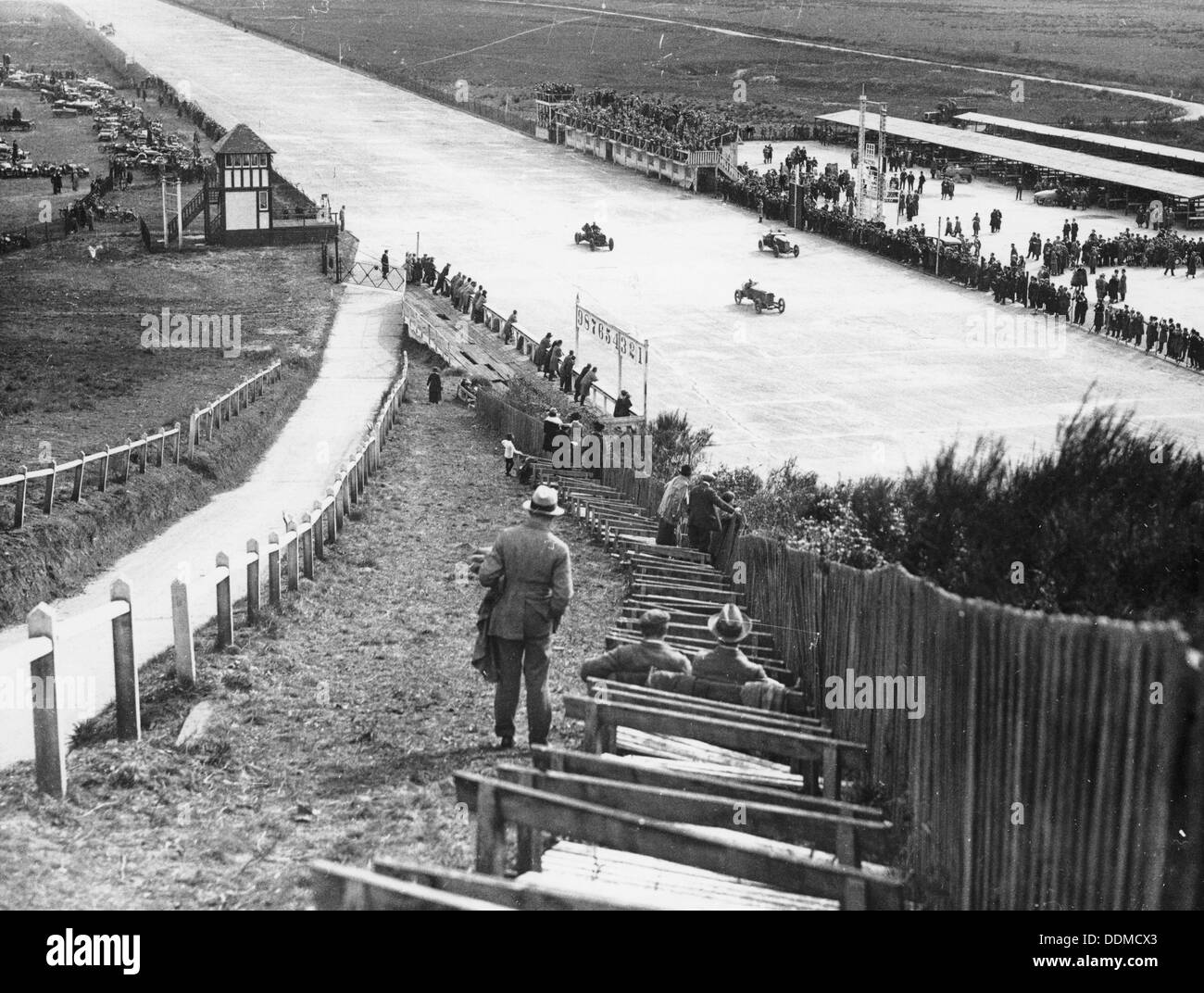 Spectators watching motor racing from the Test Hill, Brooklands, Surrey ...